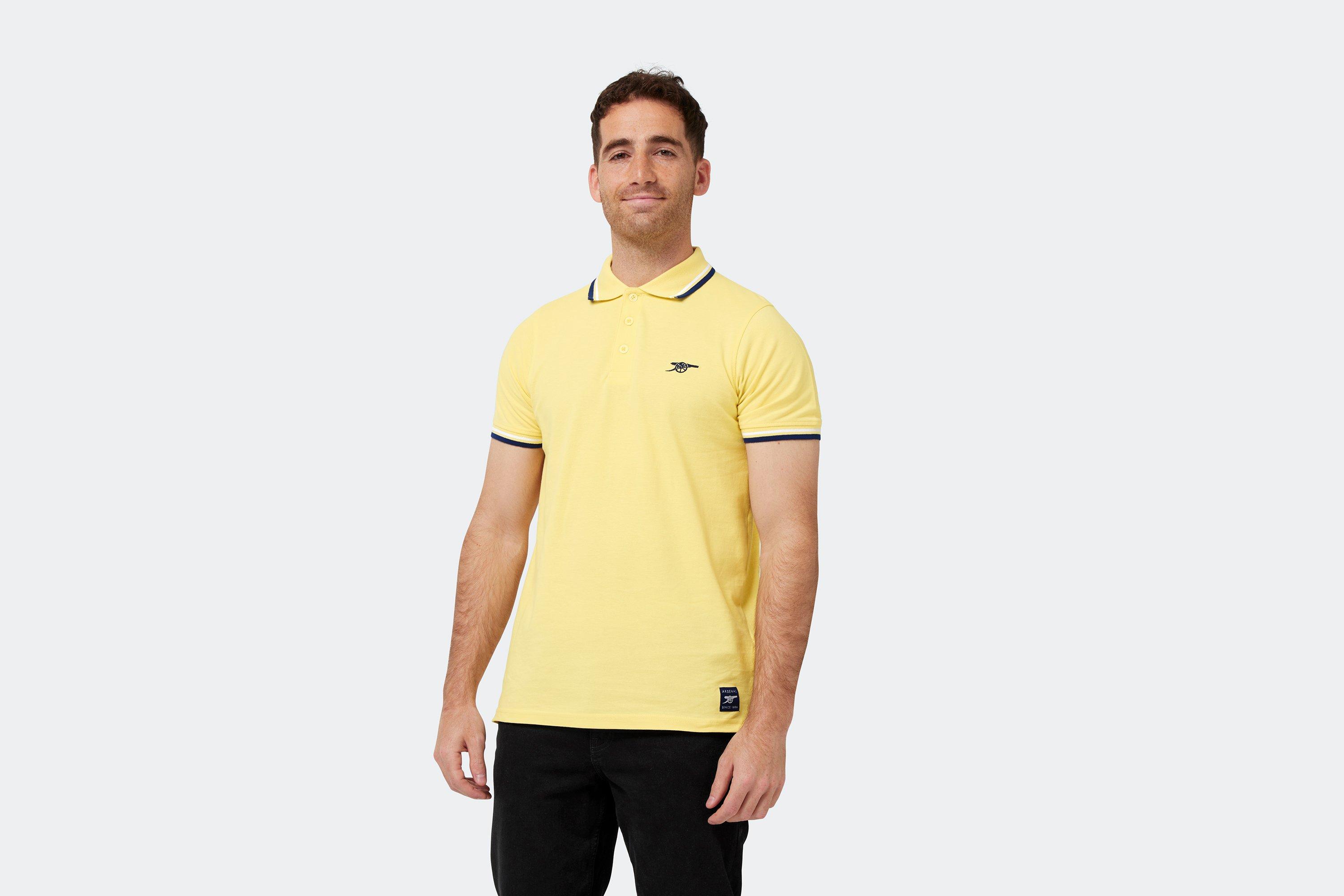 Arsenal 1886 Yellow Cannon Polo Shirt | Official Online Store